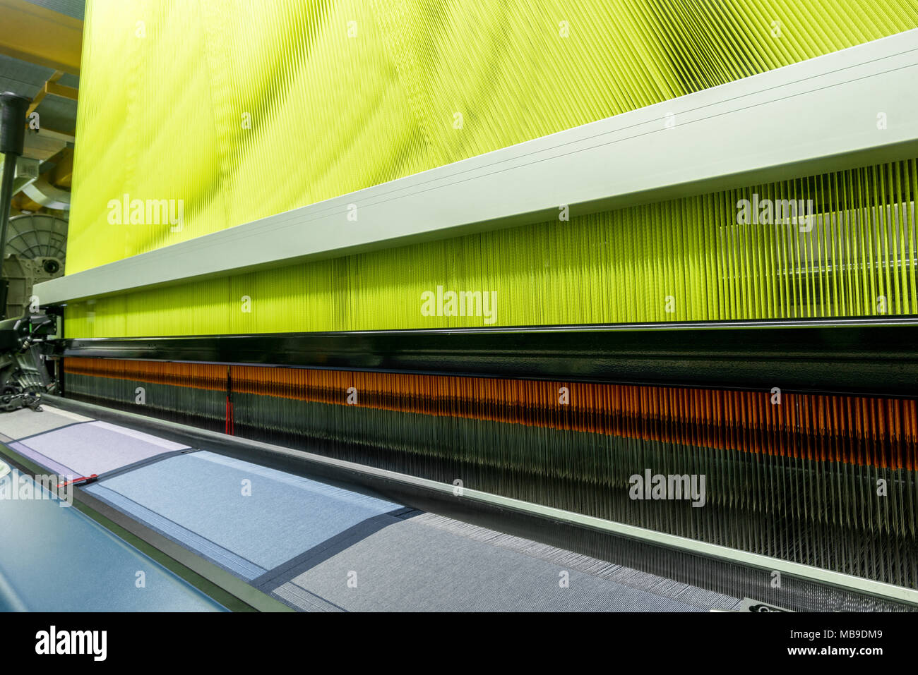 Modern weaving machine loom hi-res stock photography and images - Alamy