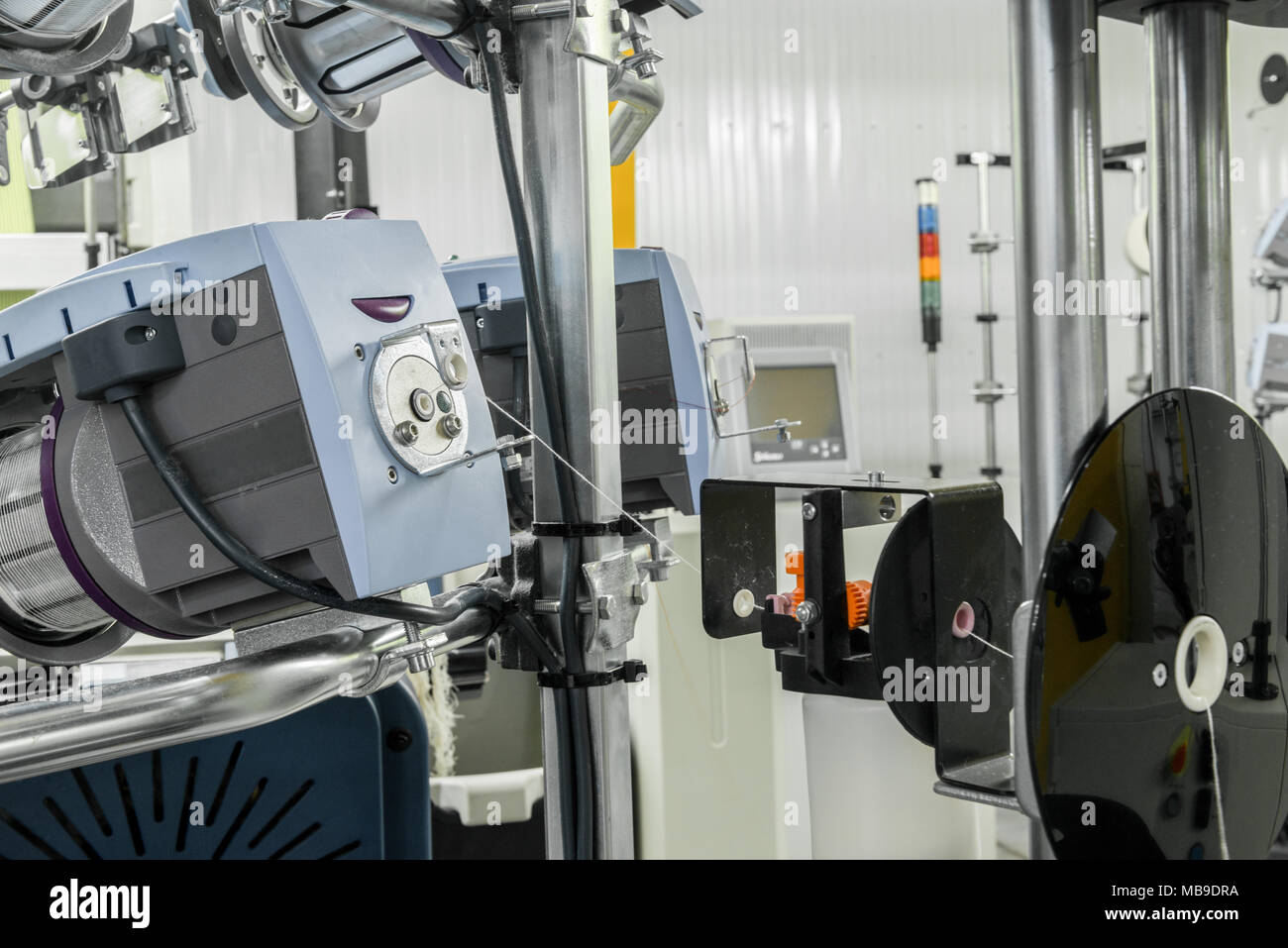 Modern weaving machine loom hi-res stock photography and images - Alamy