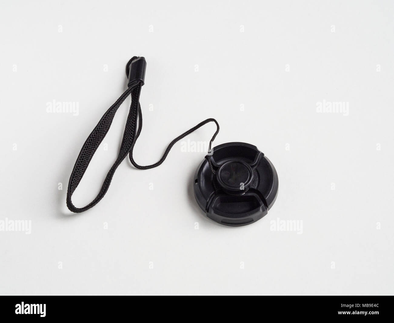 Cap lens on white background Stock Photo - Alamy