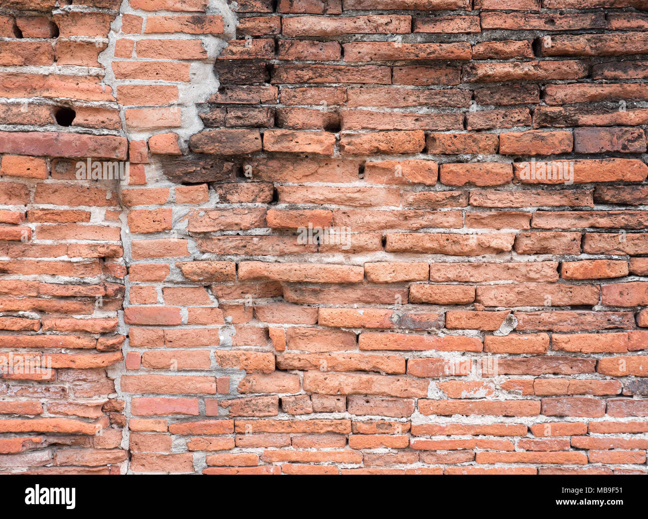 Ancient brick wall of the temple wall in the historical park Stock ...