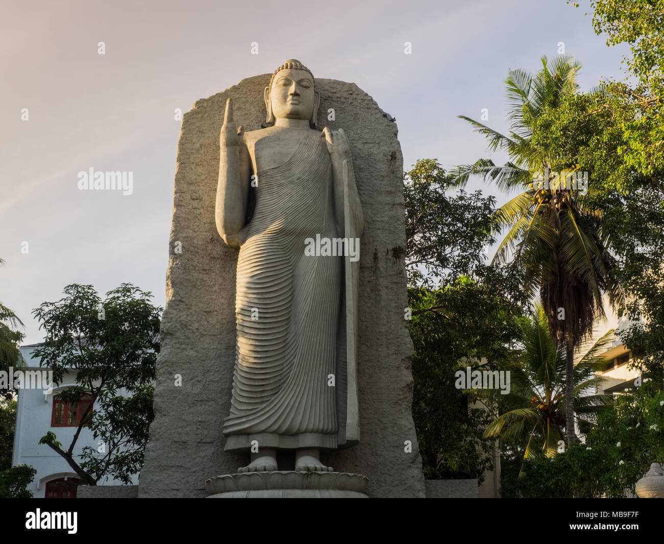 The standing Buddha statue at the Cinnamon Gardens are, Colombo, Sri ...