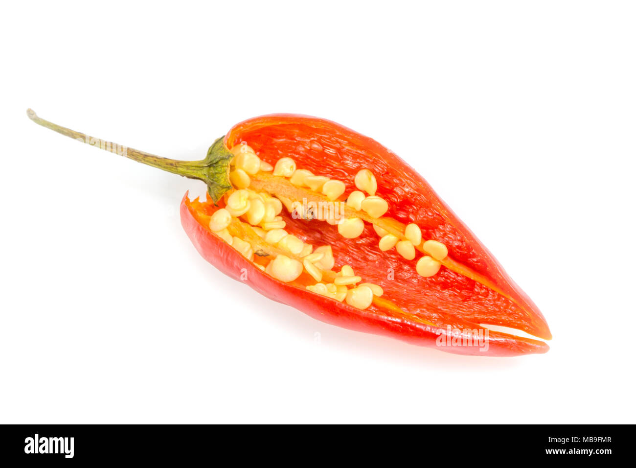 Close up of Red chilli pepper with seeds isolated on white background ...
