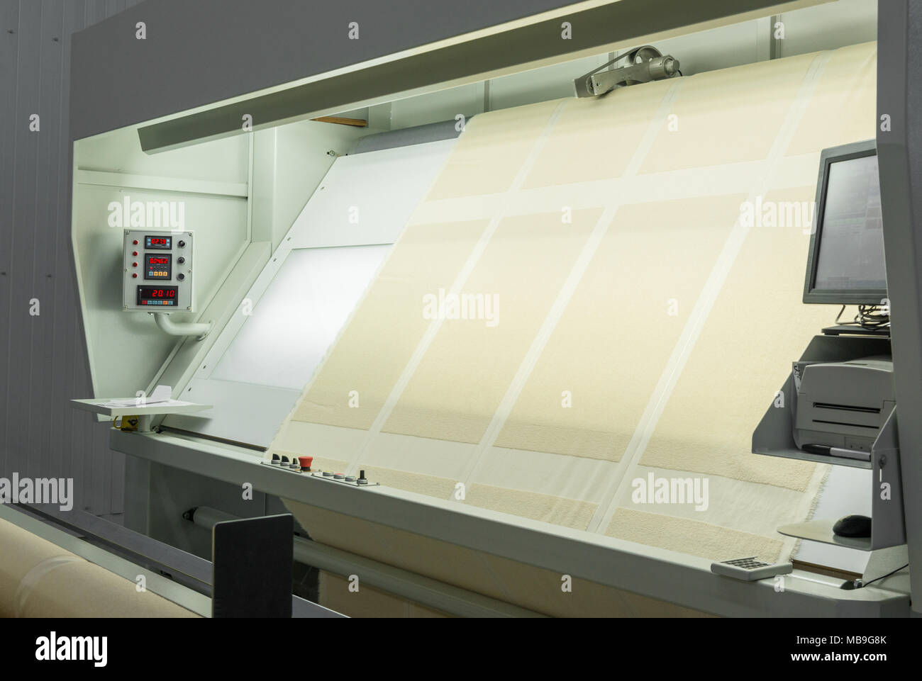 Fabric inspection machine hi-res stock photography and images - Alamy