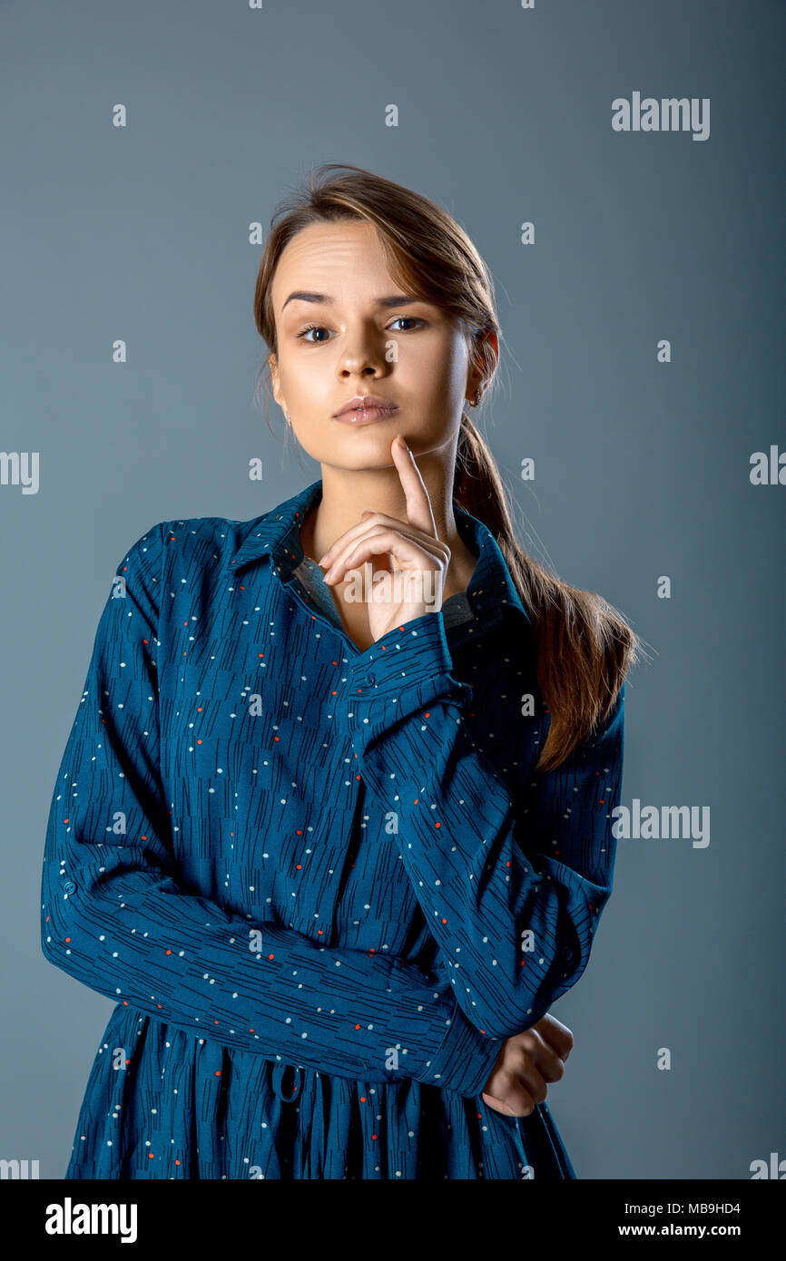 Woman hand over mouth thoughtful hi-res stock photography and images ...