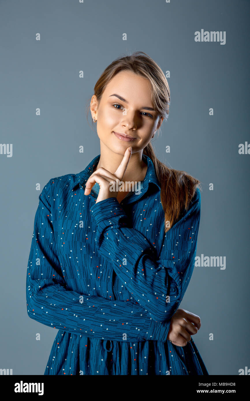 Woman hand over mouth thoughtful hi-res stock photography and images ...
