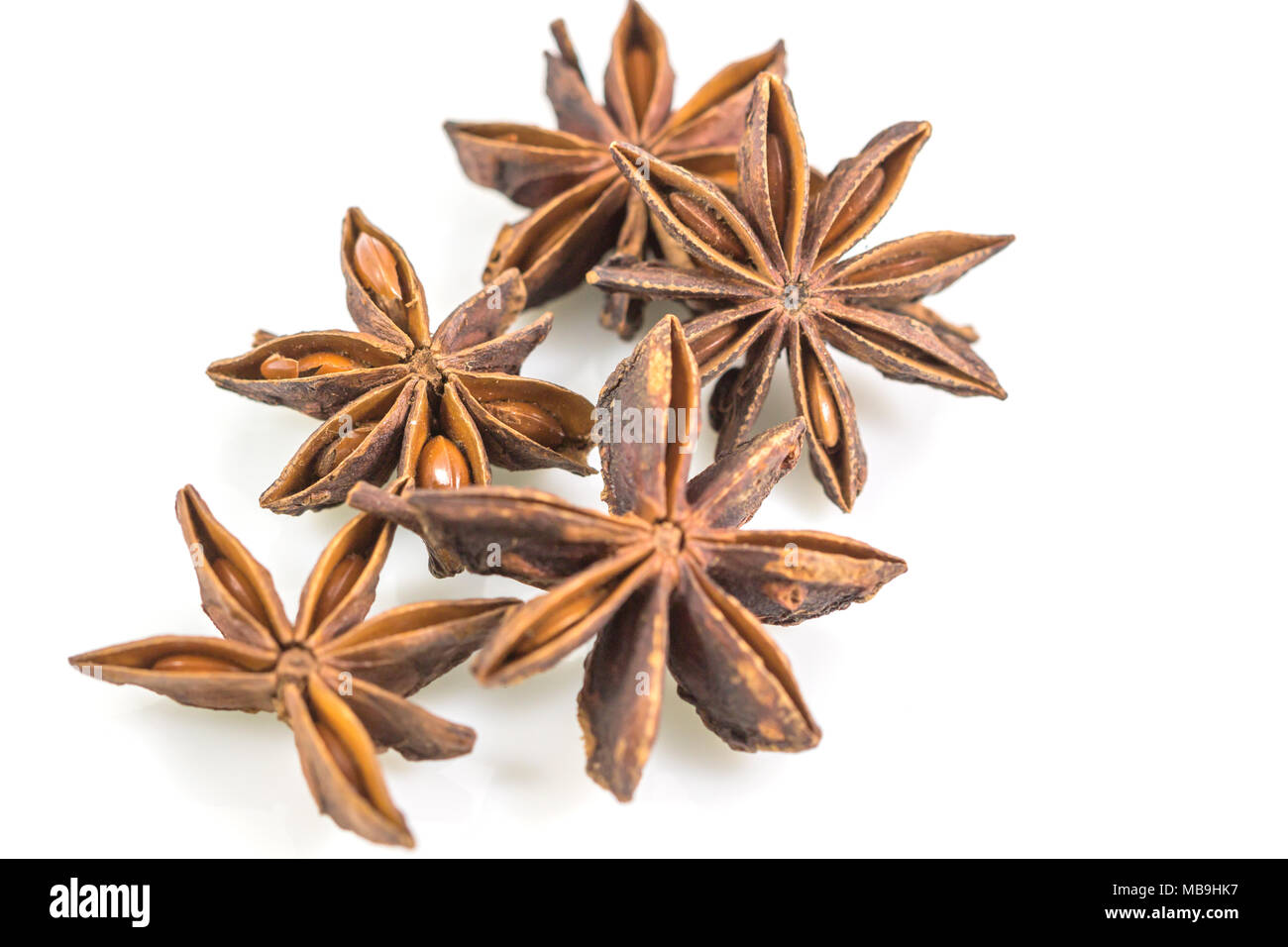 Star anise spice fruits and seeds isolated on white background, with ...