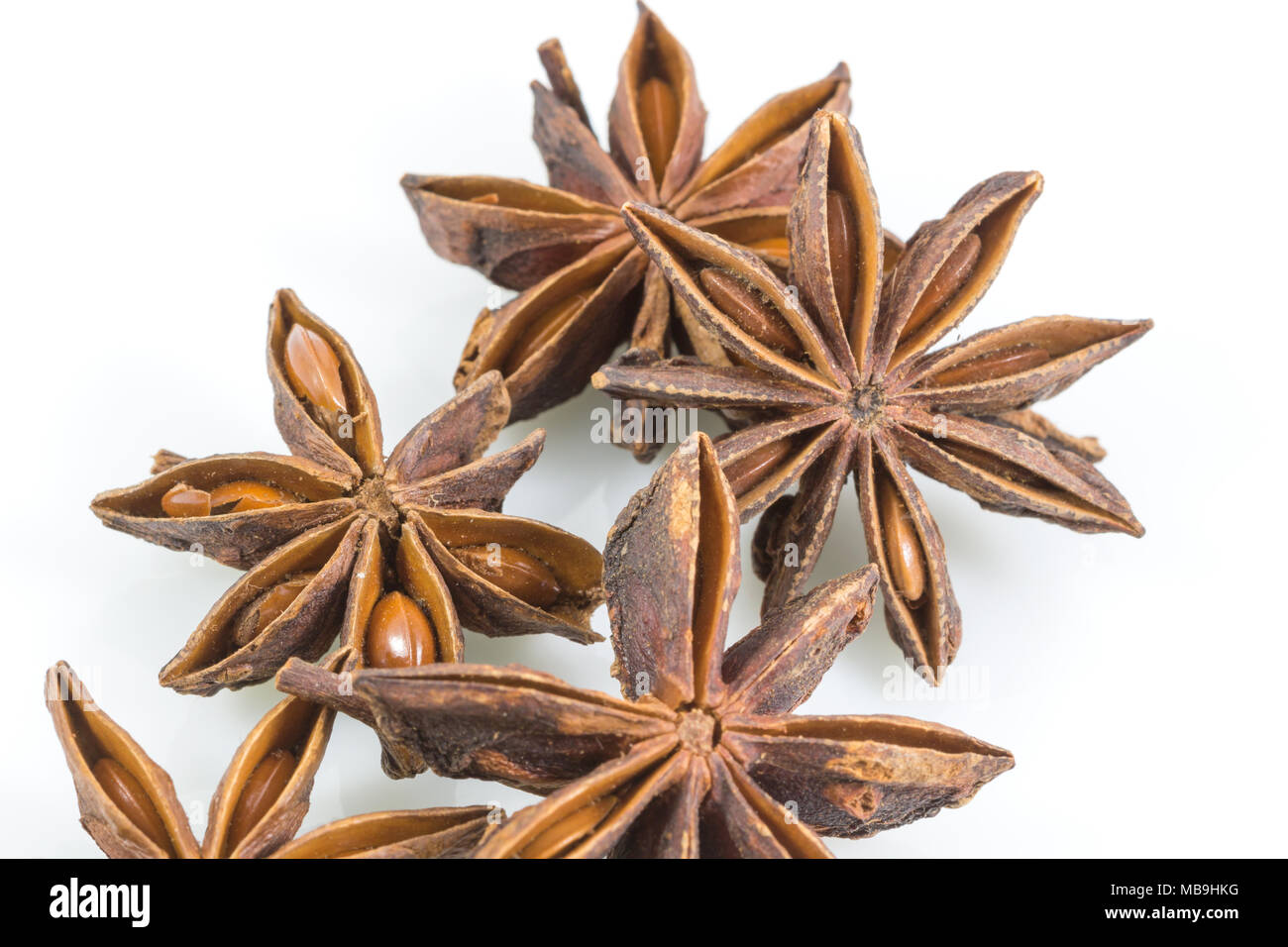 Star anise spice fruits and seeds isolated on white background, with ...