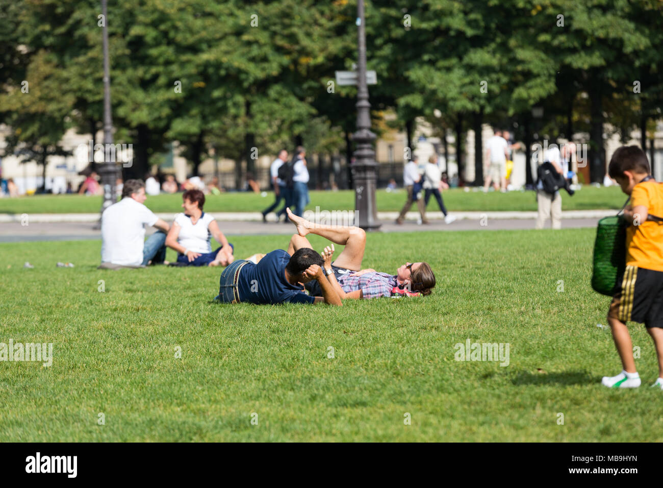 People resting in the park near main entrance Les Invalides. Paris ...