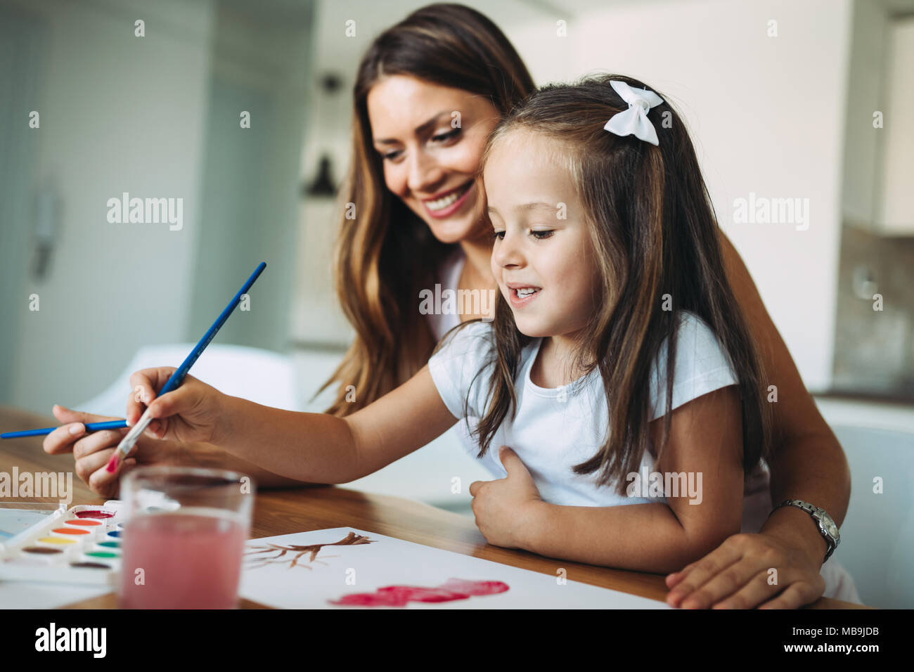 Happy family having fun time at home Stock Photo - Alamy