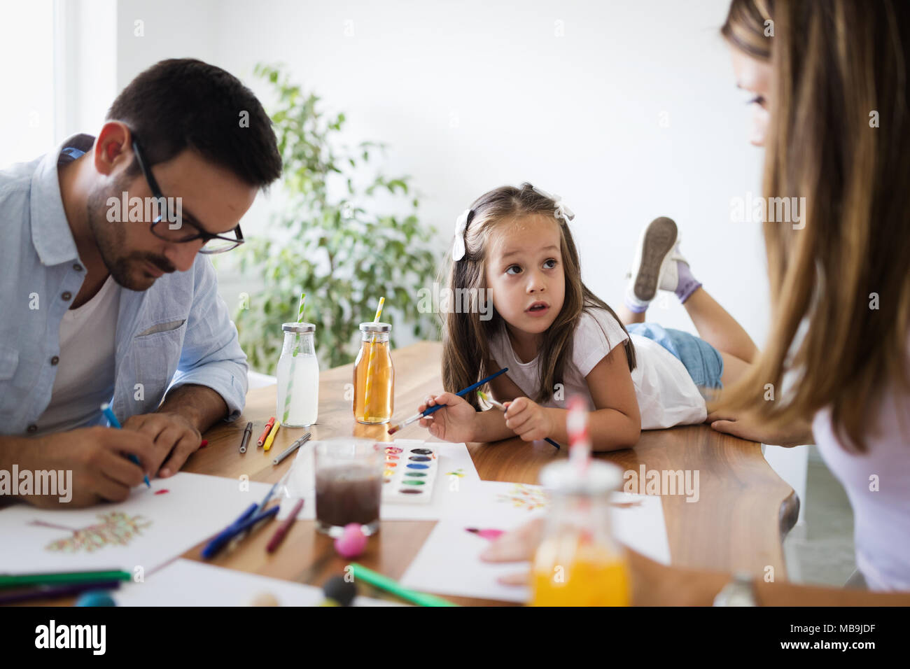 Happy family having fun time at home Stock Photo - Alamy