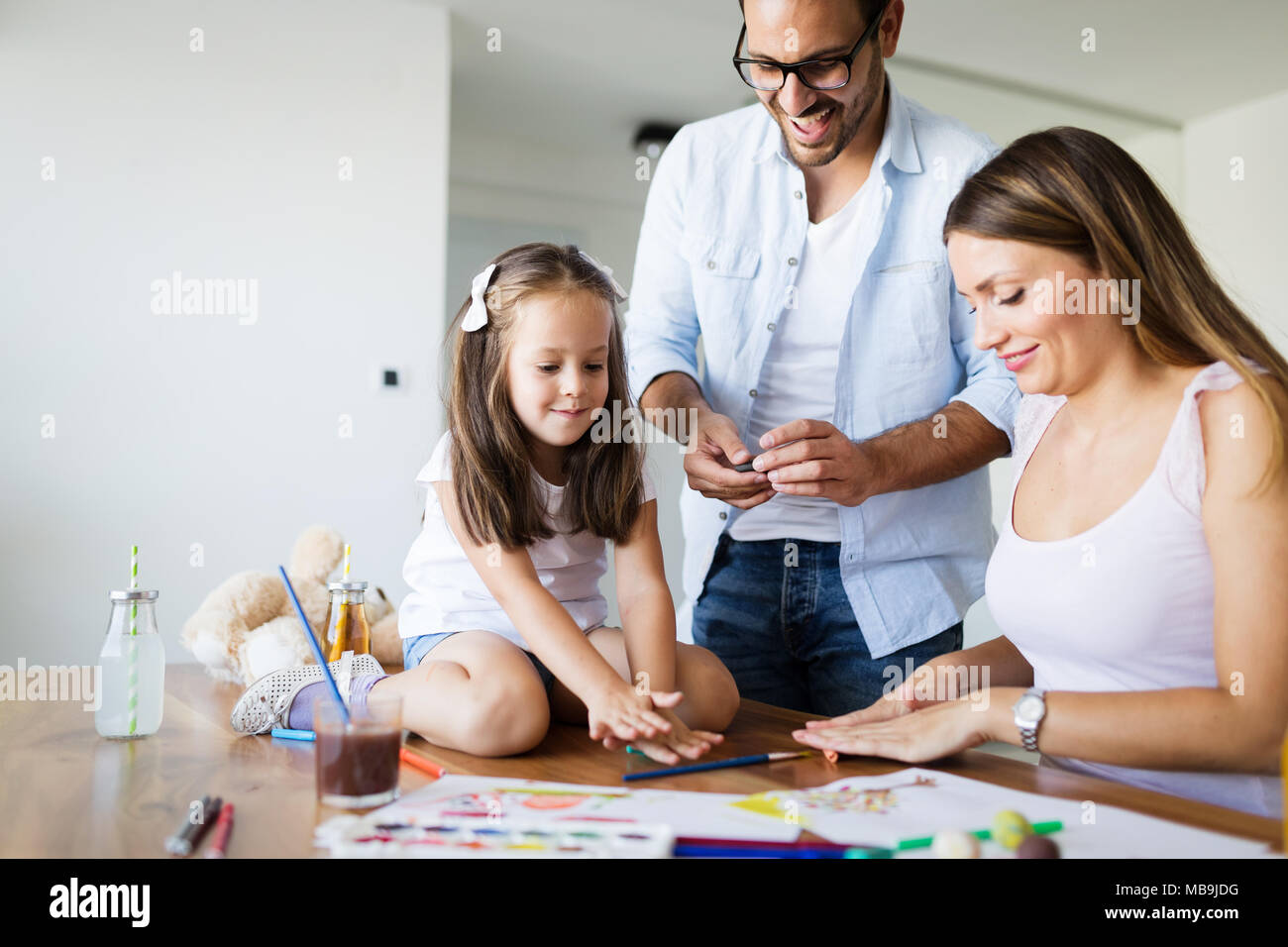 Happy family having fun time at home Stock Photo - Alamy