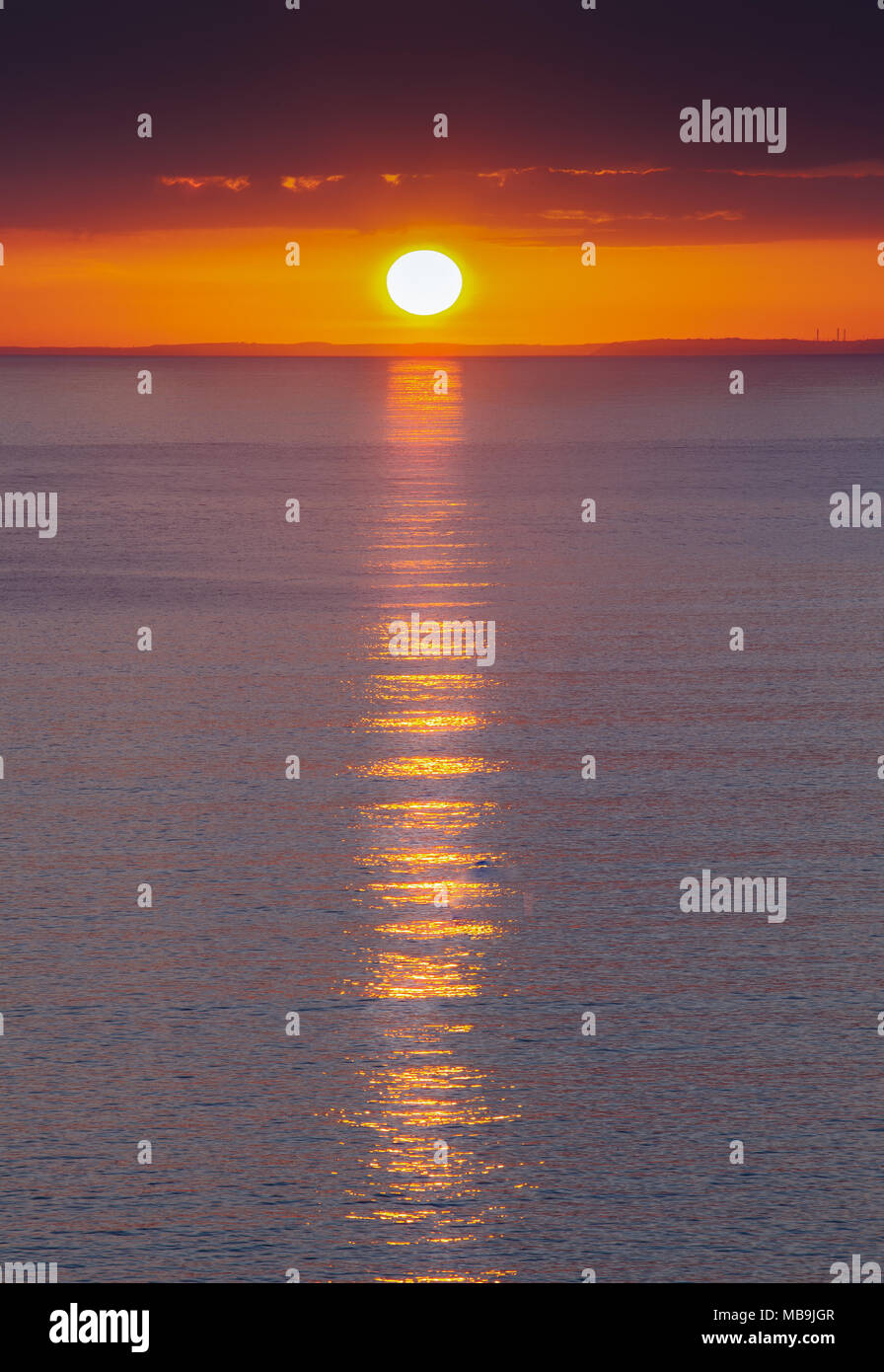 Gower sunset at Rhossili Bay Stock Photo - Alamy