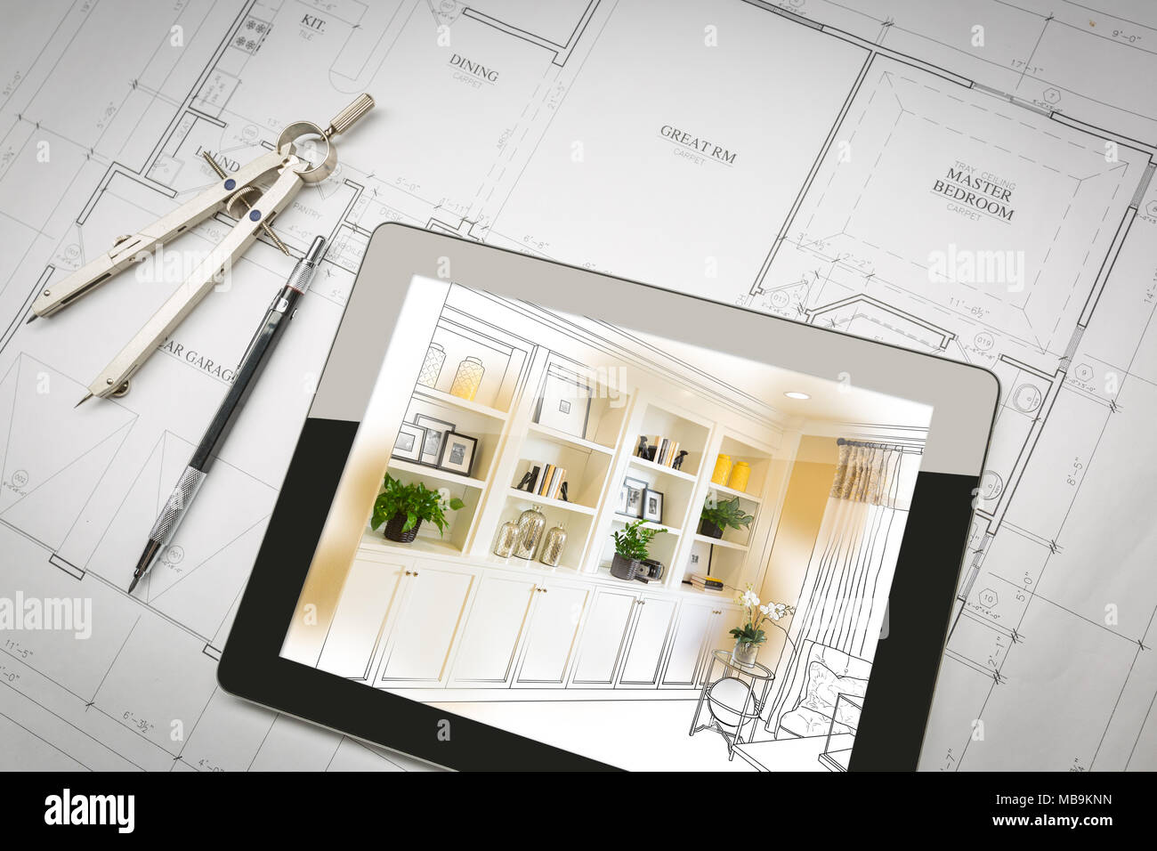 Computer Tablet with Finished Built-in Shelves and Cabinets Over House ...