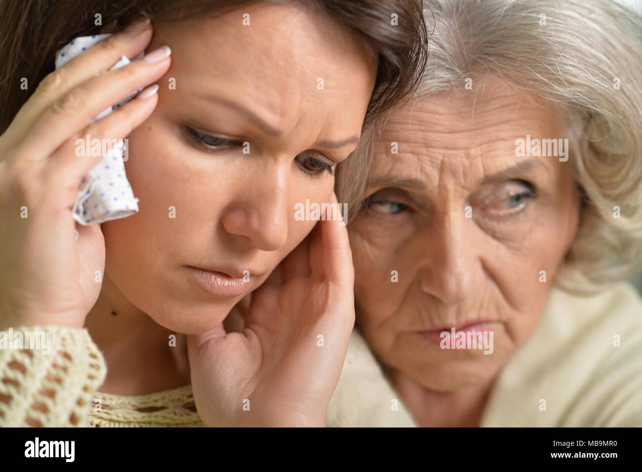 Young sad elderly hi-res stock photography and images - Alamy