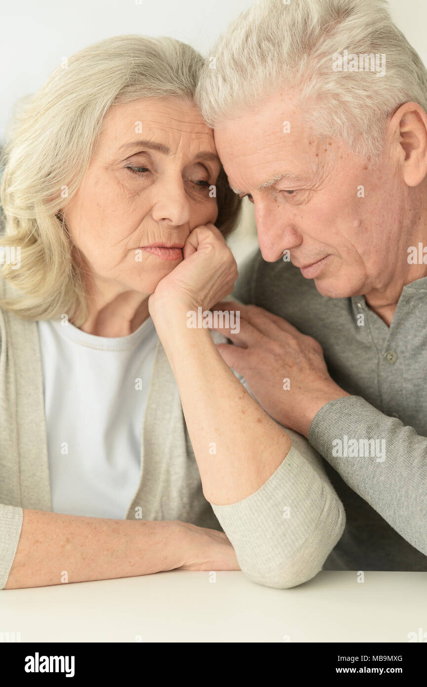 Sad senior couple Stock Photo - Alamy