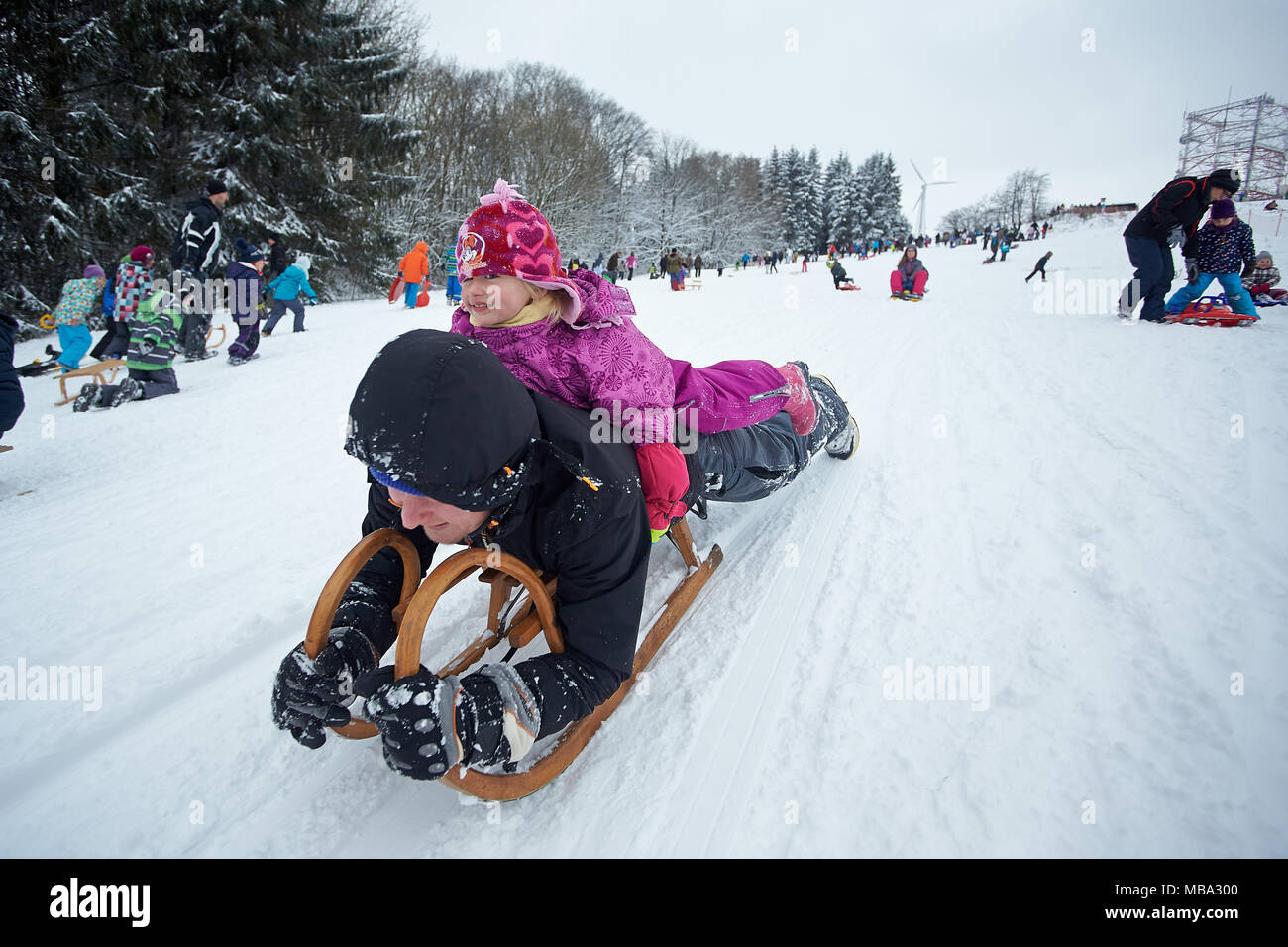 Salzburg, Germany. 17th Jan, 2016. Jens sledging with his daughter ...