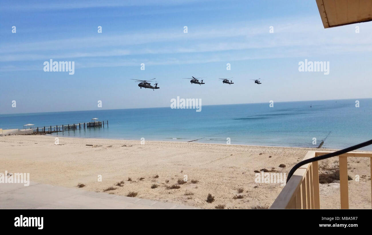 KUWAIT NAVAL BASE, Kuwait – A formation of UH-60 Blackhawks assigned to ...