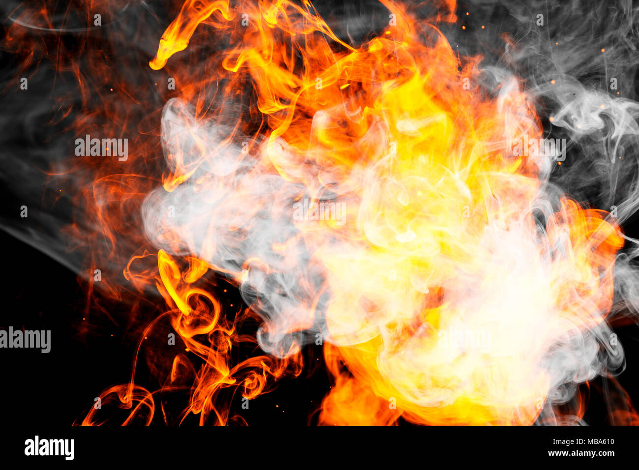 Fire flames background. Dense fiery smoke on a black isolated ...