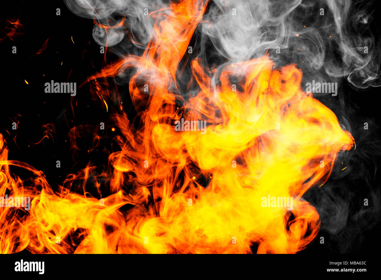 Fire flames background. Cloud of fiery smoke on a black isolated ...