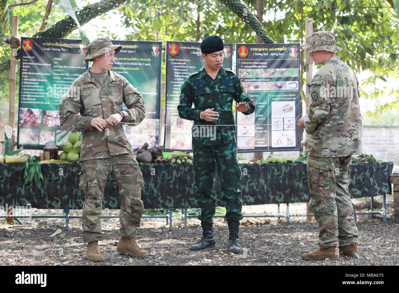 Royal Thai Army Capt. Jatupon Niyompattama (center), company commander ...