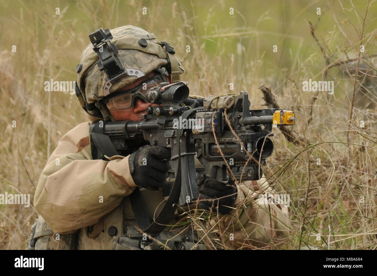 Soldiers from 2nd Battalion, 3th Infantry Regiment, scan their sectors ...