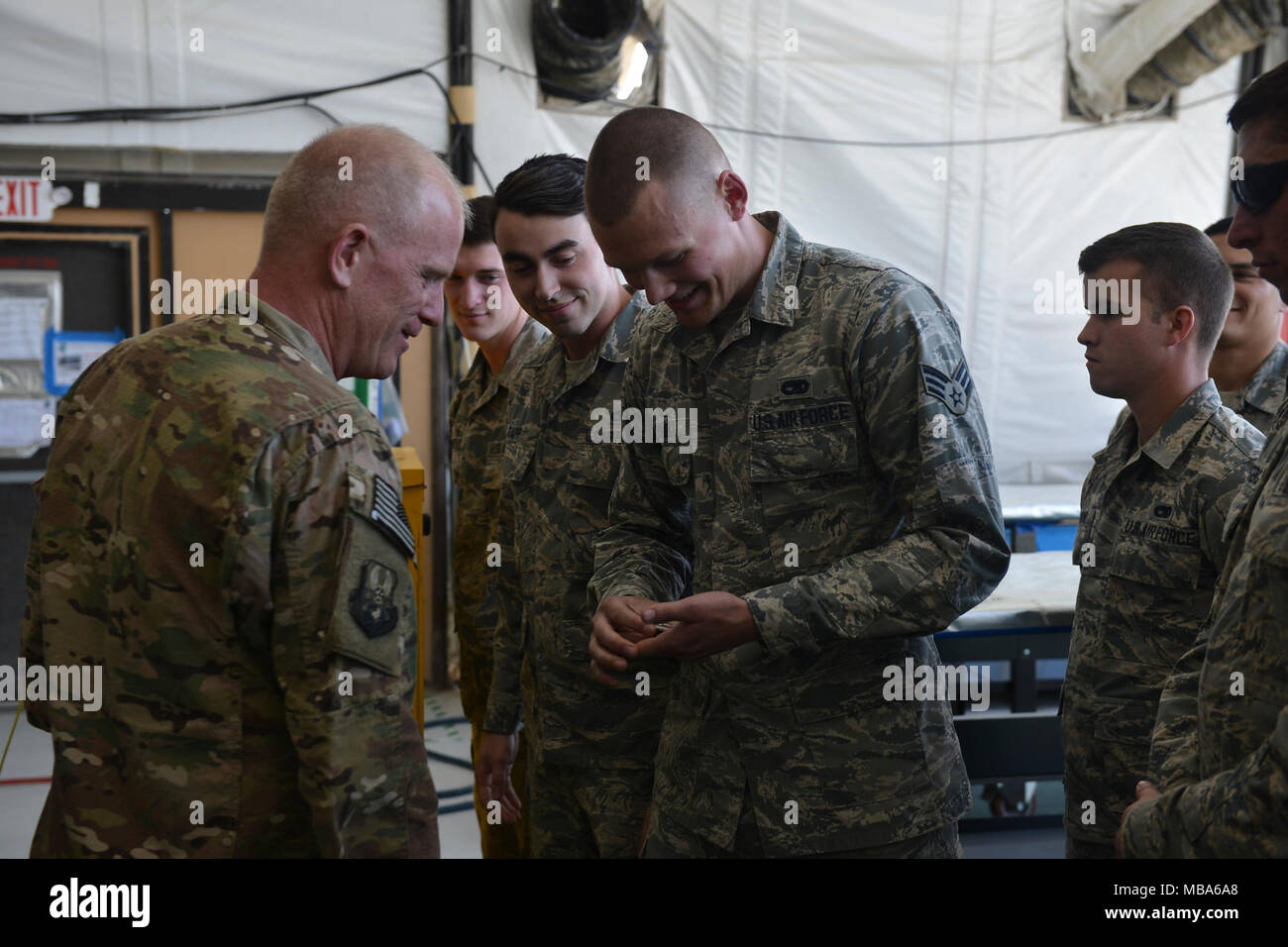 U.S. Air Force Airman 1st Class Anthony Gosnell shows Chief Master Sgt ...