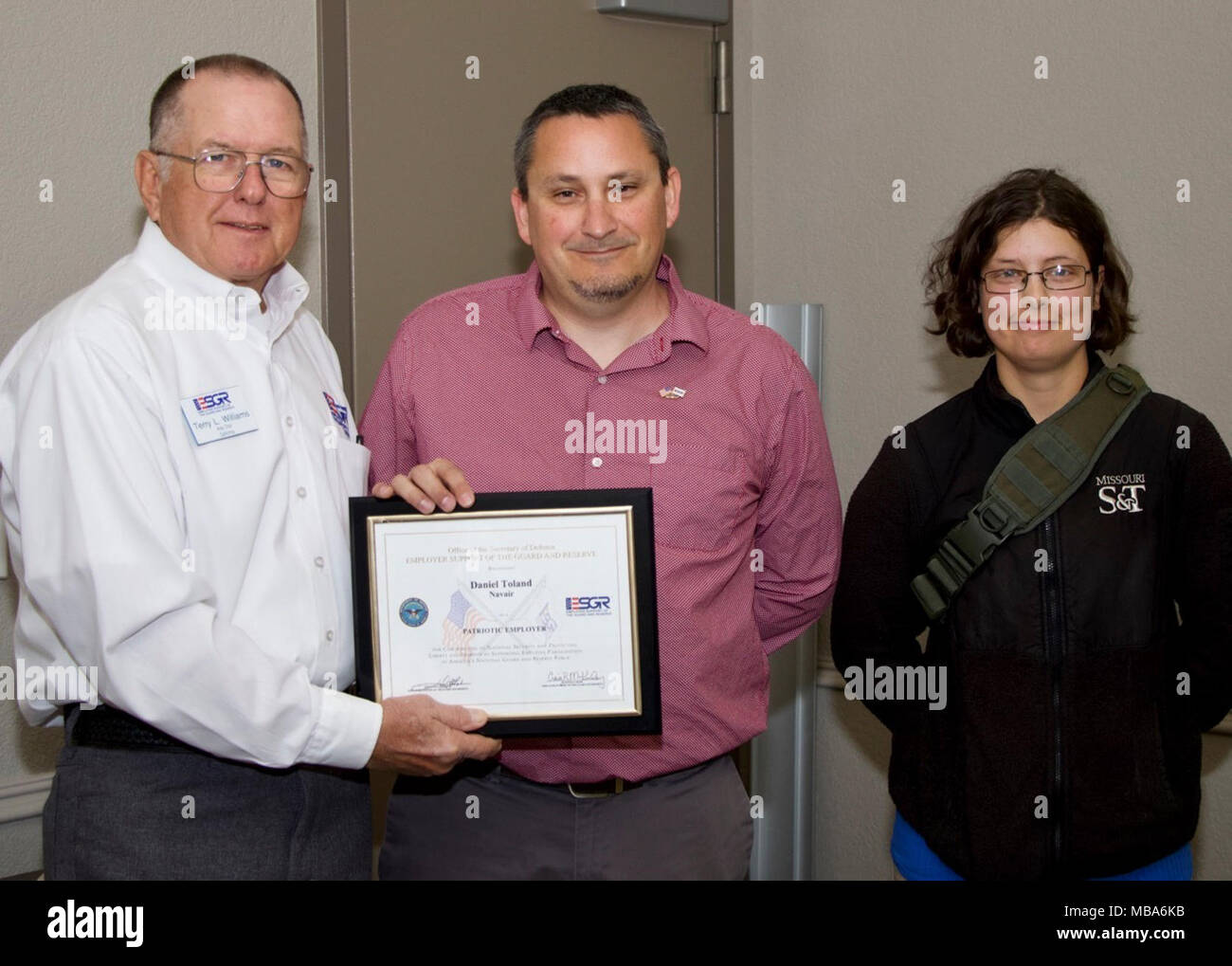 Dan Toland, center, of the Integrated System Evaluation ...
