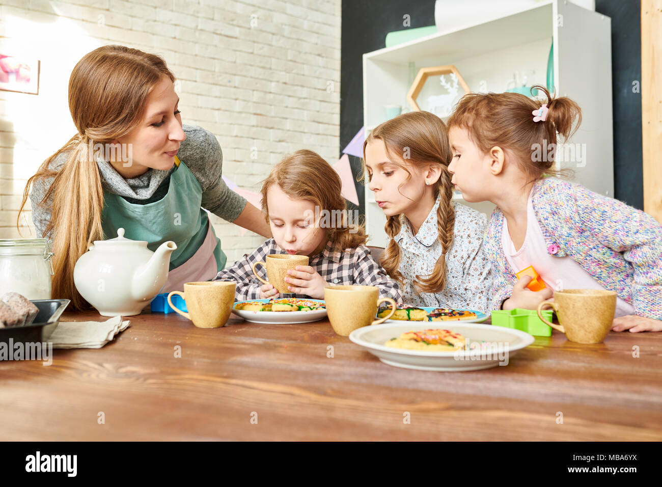 Loving Family at Dining Room Stock Photo - Alamy