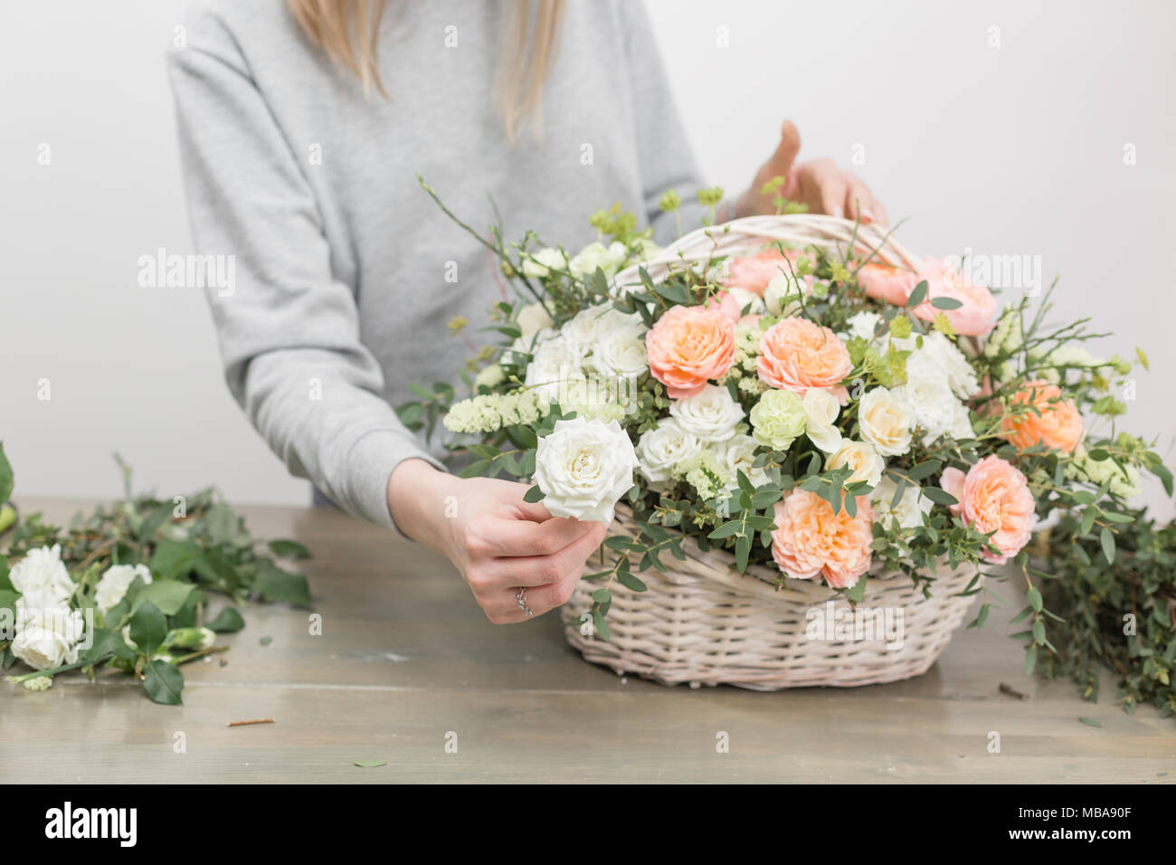 close-up hands female florist. Floral workshop - woman making a ...
