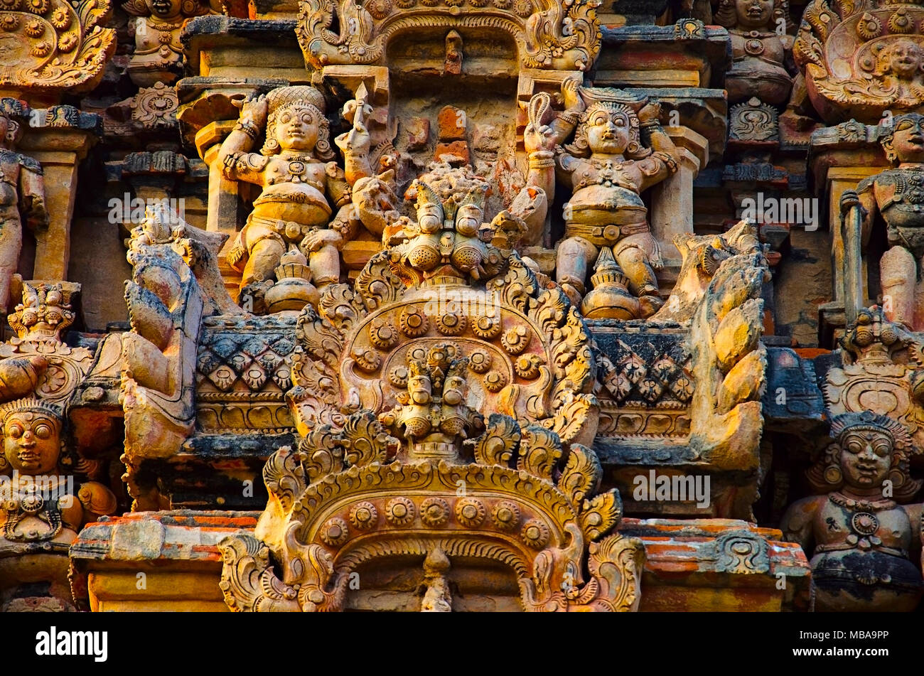 Carved idols on the Gopuram of the Brihadishvara Temple, Thanjavur ...