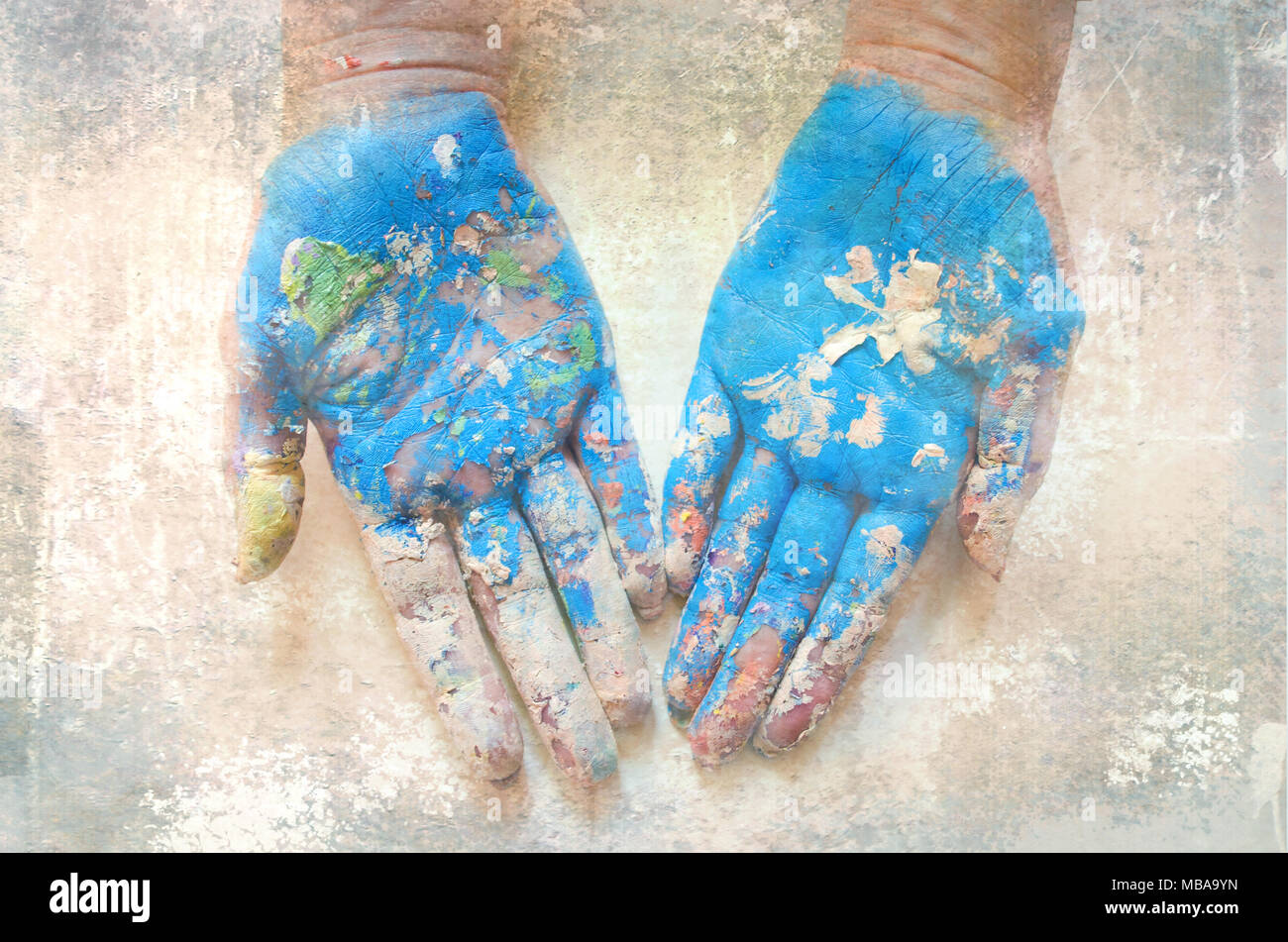 Hands in paint hi-res stock photography and images - Alamy