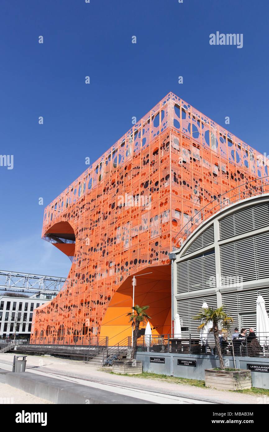 The orange cube building at Confluence harbor in Lyon, France Stock ...
