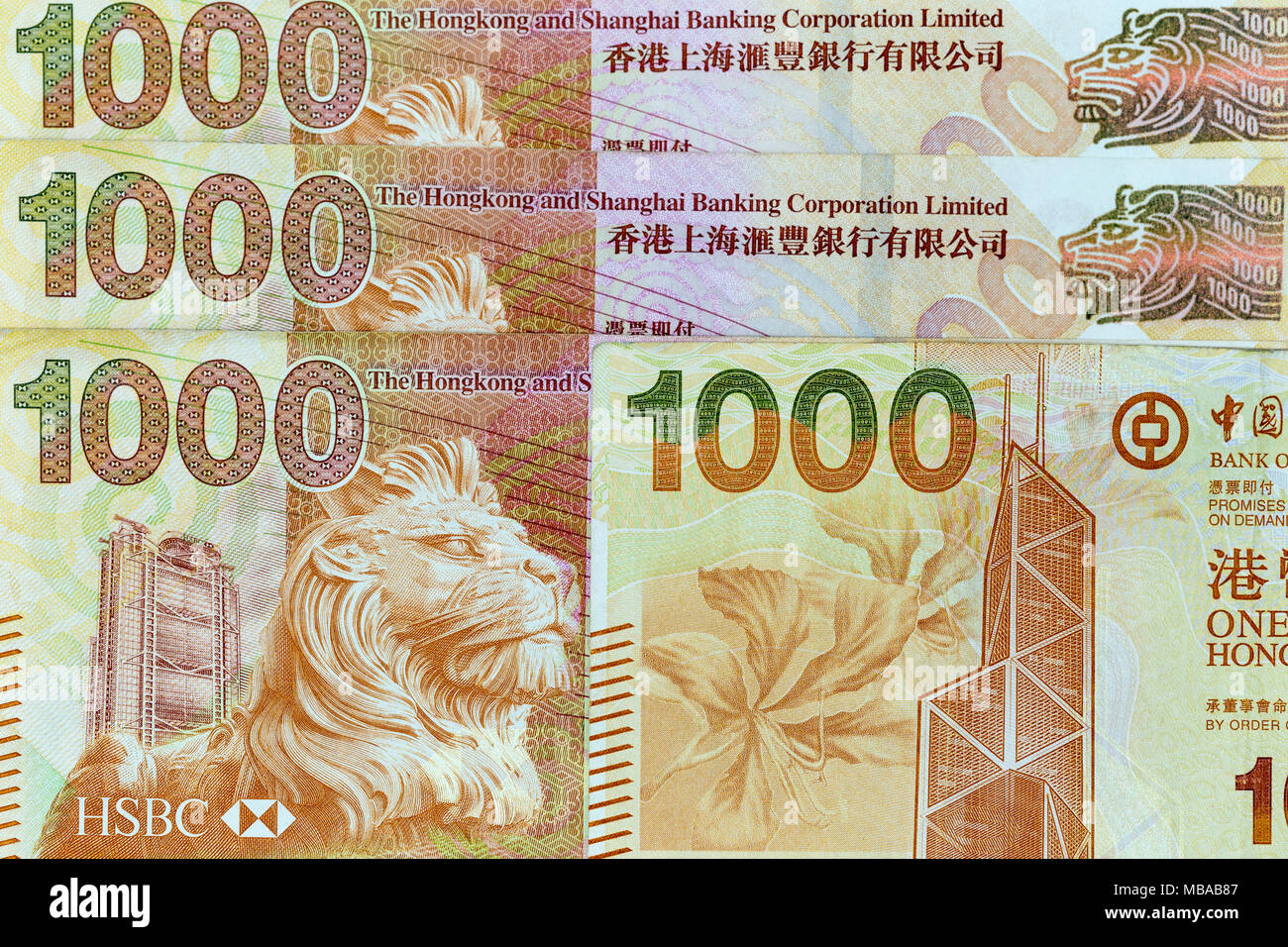 Currency banknotes spread across frame hong kong dollar in various ...