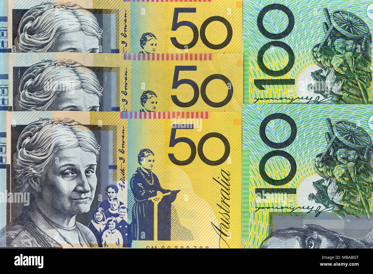 Currency banknotes spread across frame australian dollar in various ...