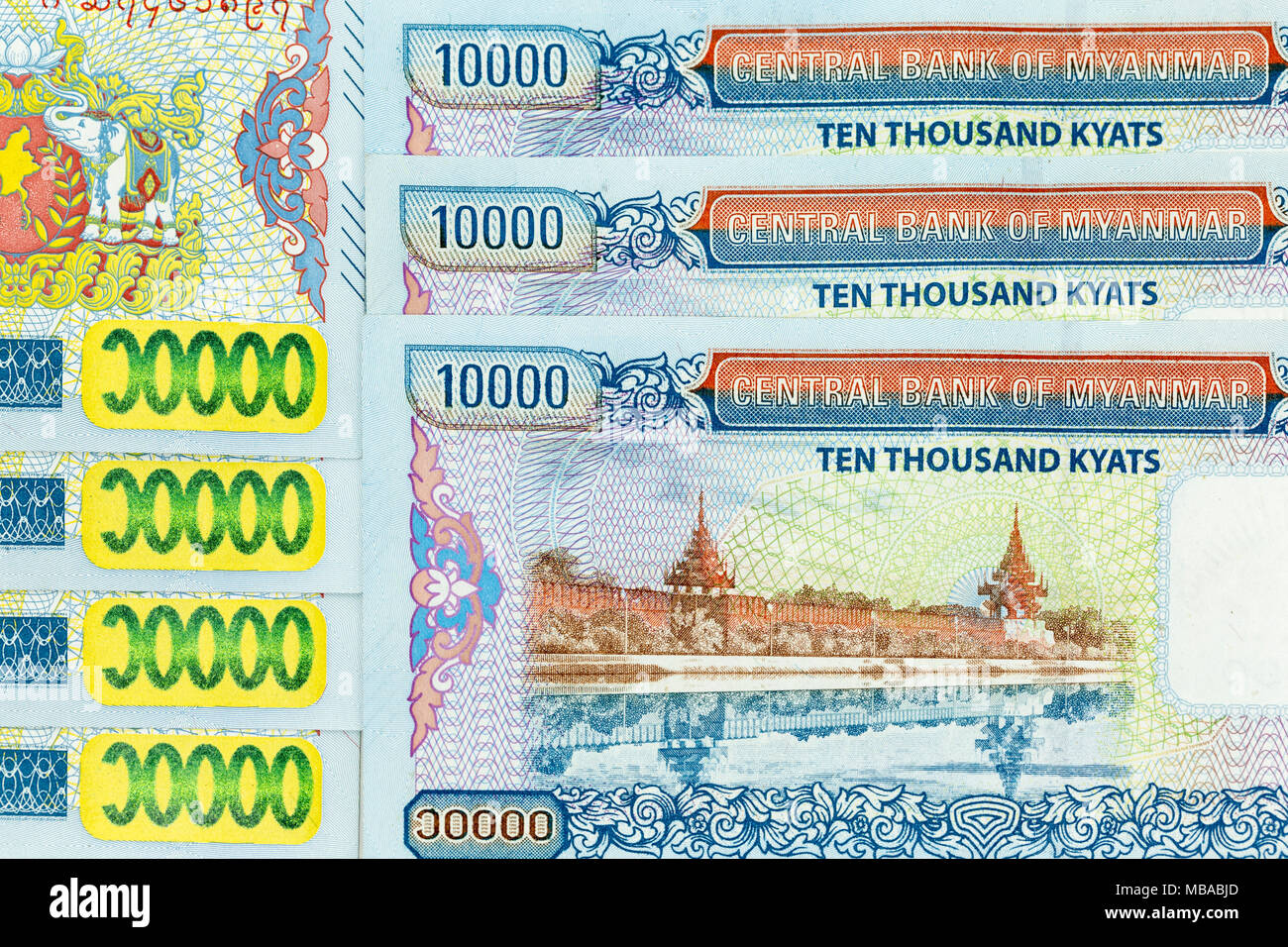 Currency banknotes spread across frame myanmar kyat in various ...