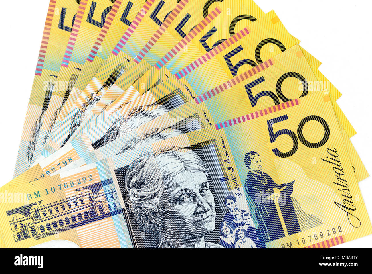 Currency banknotes spread across frame australian dollar in various ...