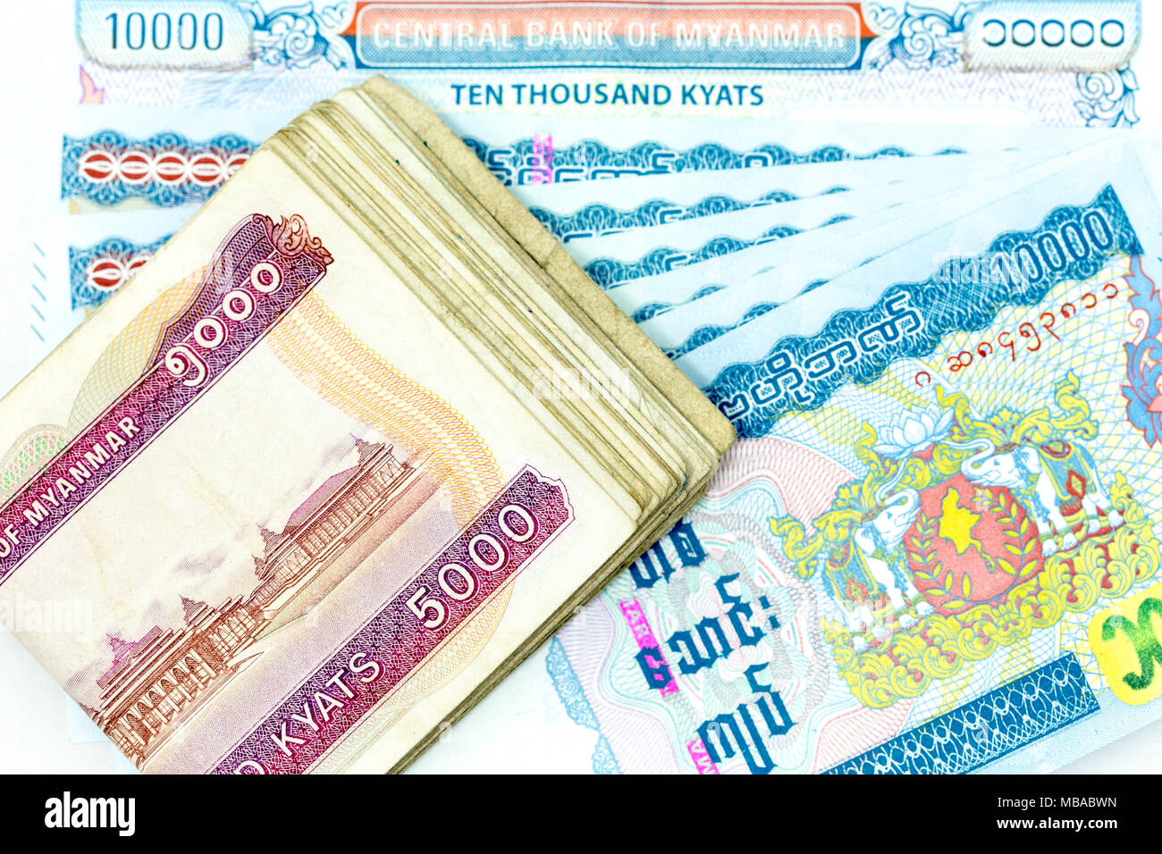 Currency banknotes spread across frame myanmar kyat in various ...