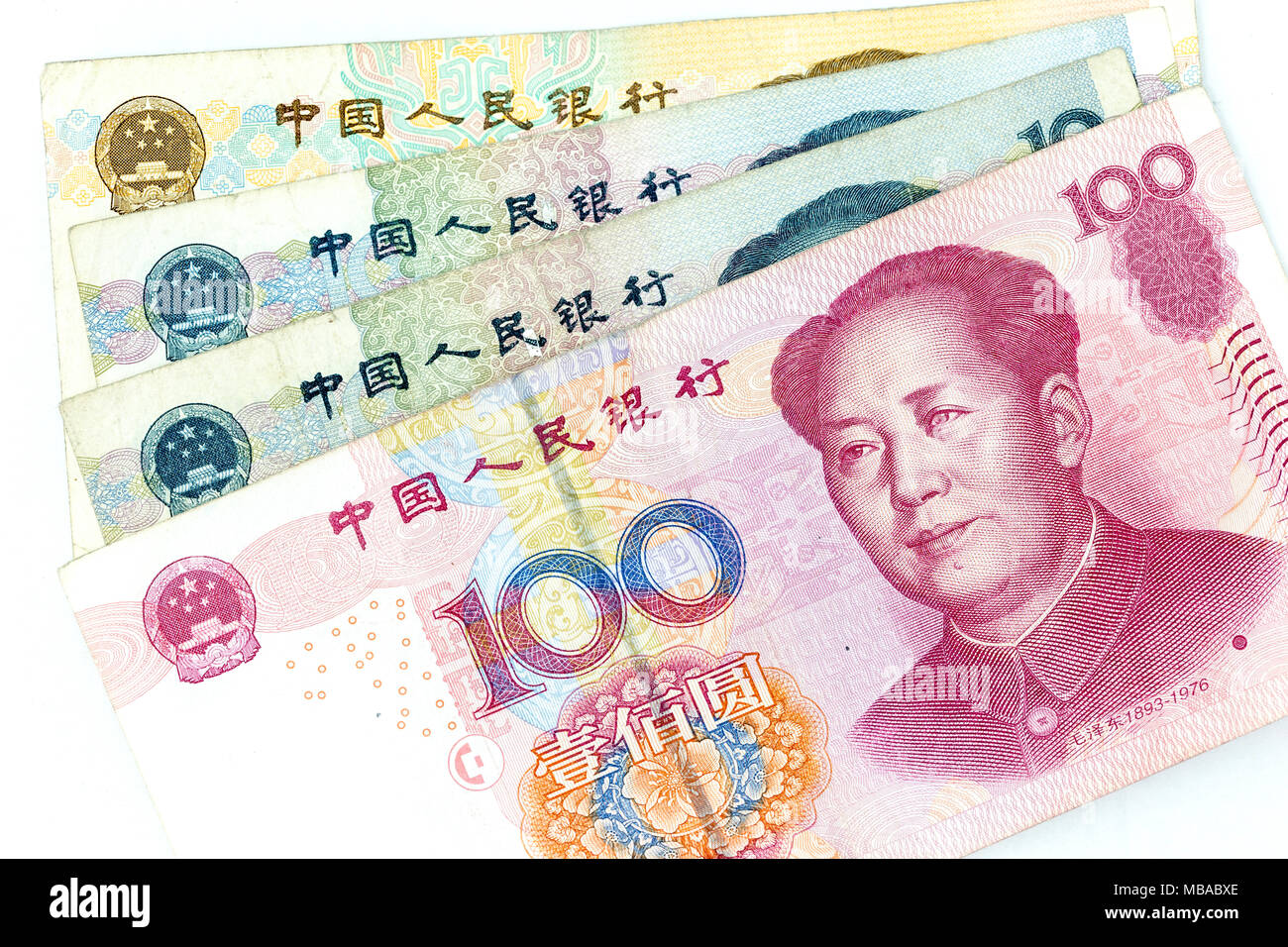 Currency banknotes spread across frame china renminbi in various ...