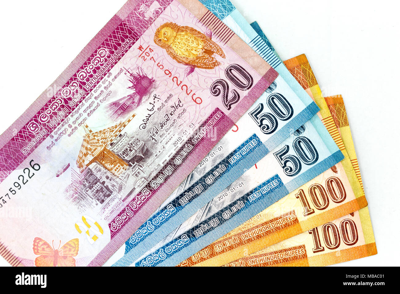 Currency banknotes spread across frame sri lankan rupee in various ...