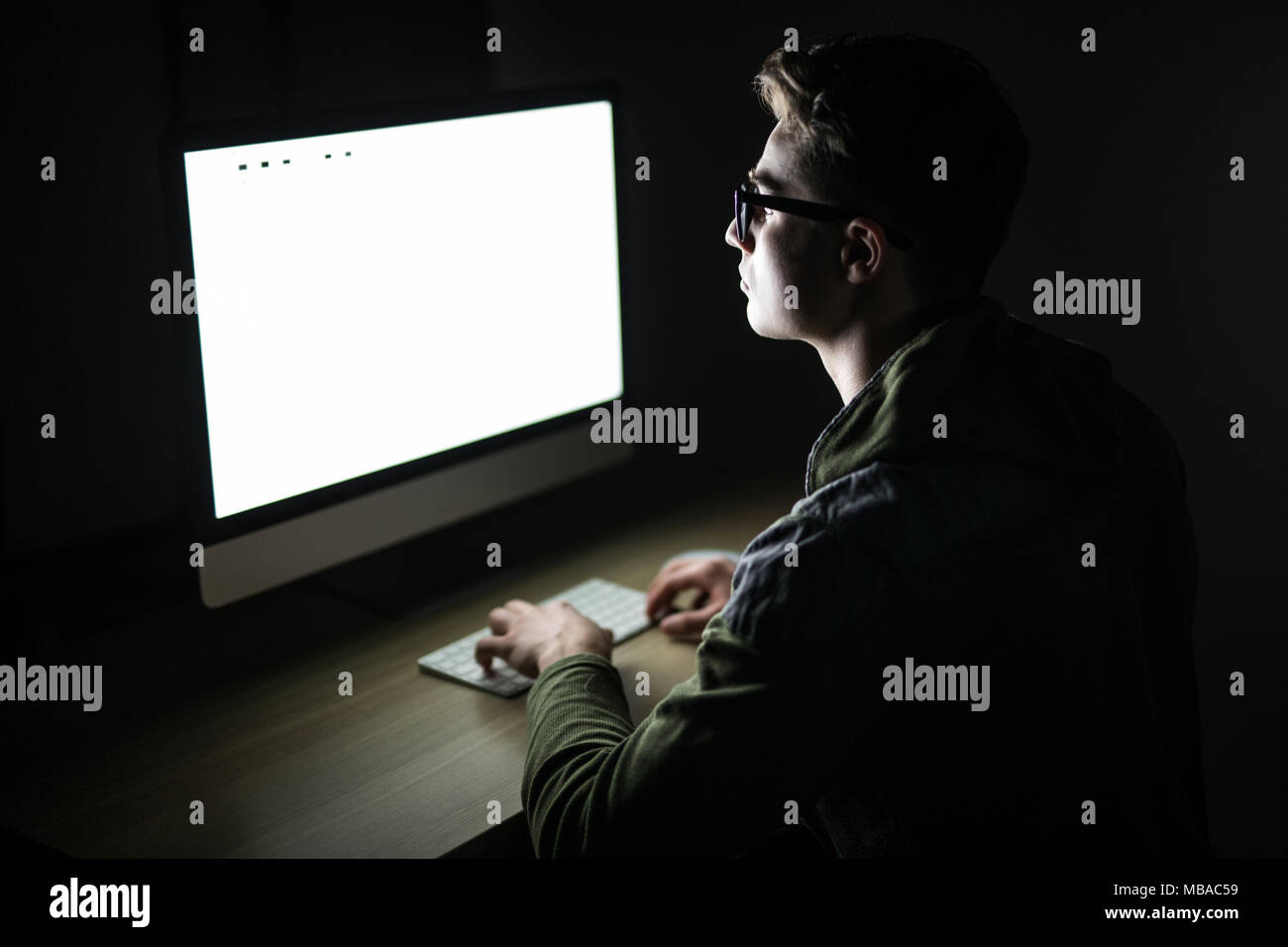 Handsome male programmer, IT person, hacker, works in computer on ...