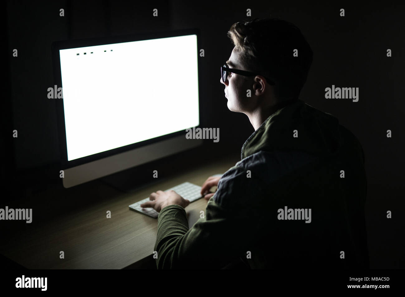 Handsome male programmer, IT person, hacker, works in computer on ...