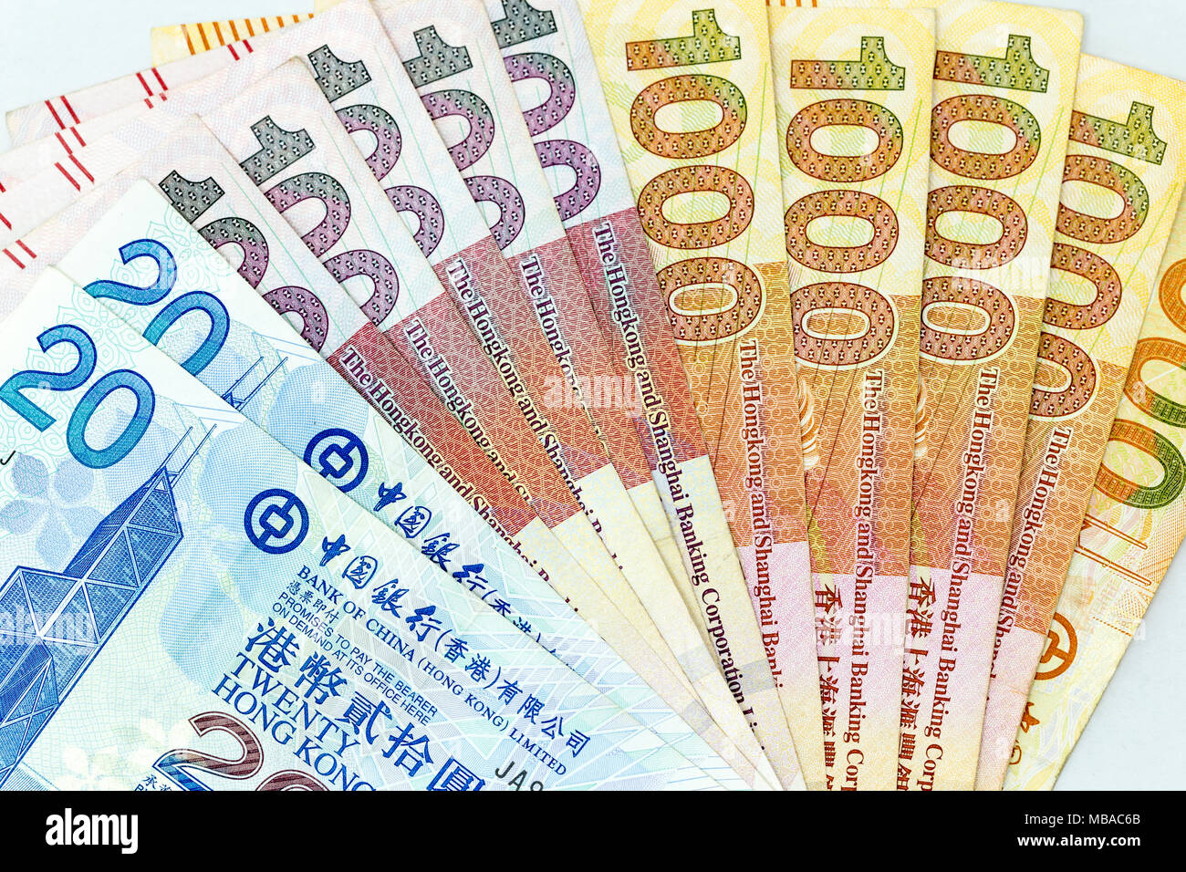 Currency banknotes spread across frame hong kong dollar in various ...