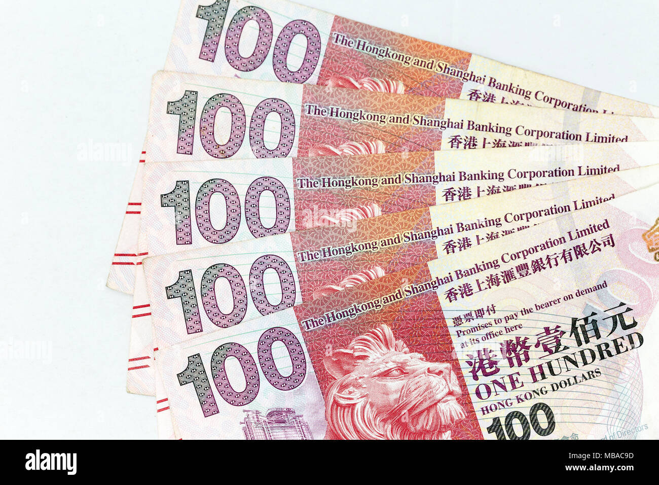 Currency banknotes spread across frame hong kong dollar in various ...