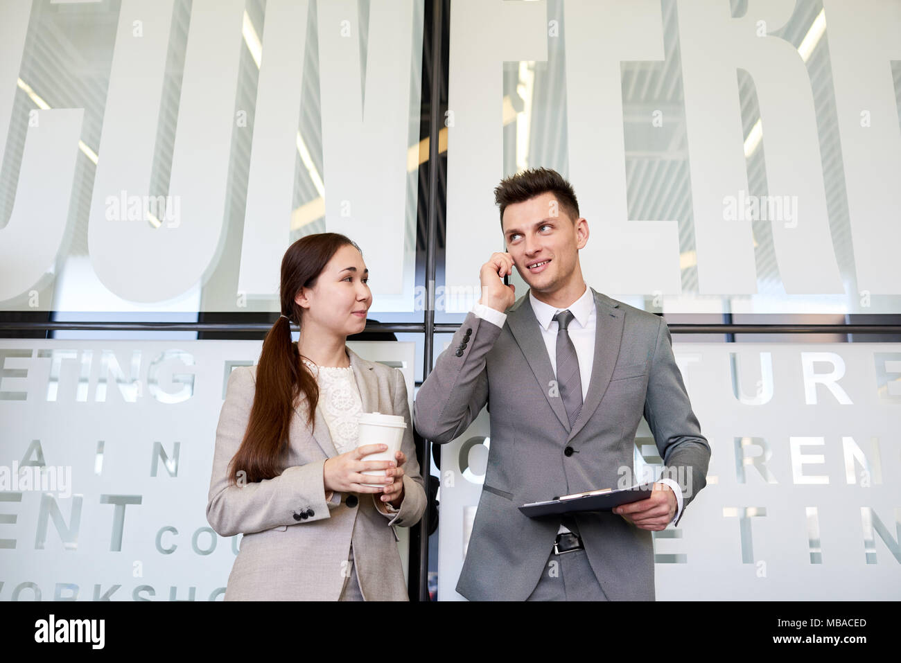 Business Colleagues at Coffee Break Stock Photo - Alamy