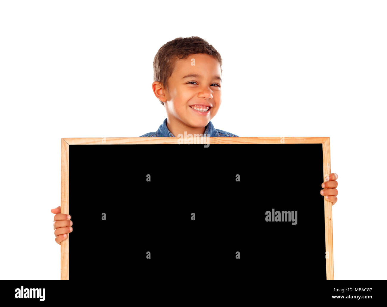 Happy child holding a blank slate isolated on a white background Stock ...
