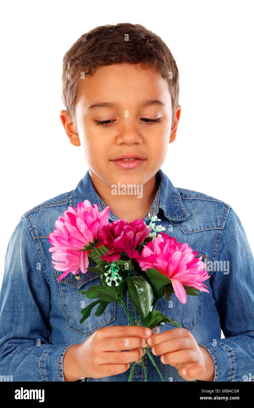Happy boy with a beautiful bouquet of pink flowers isolated on a white ...