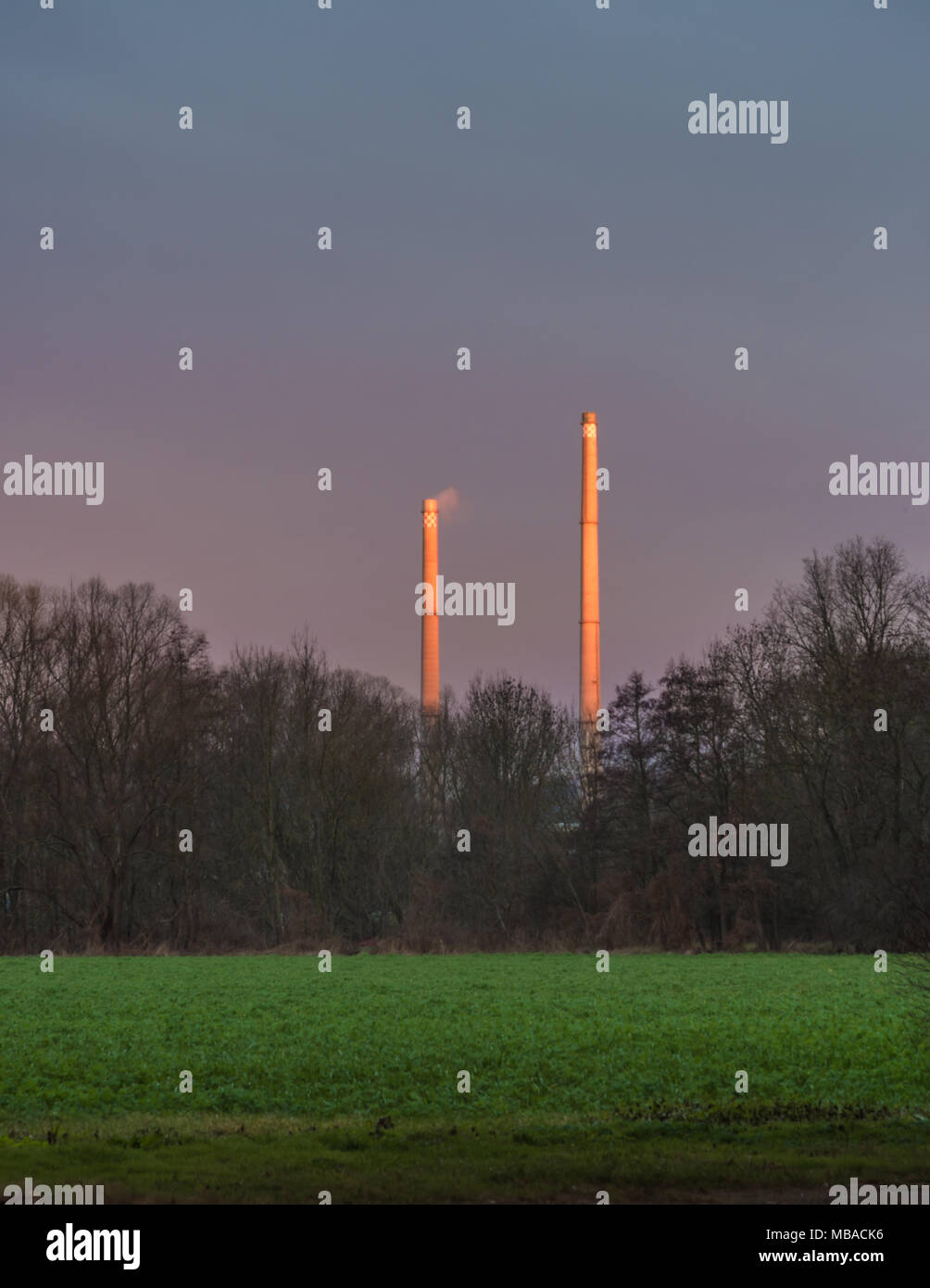 Two smoking chimneys hi-res stock photography and images - Alamy