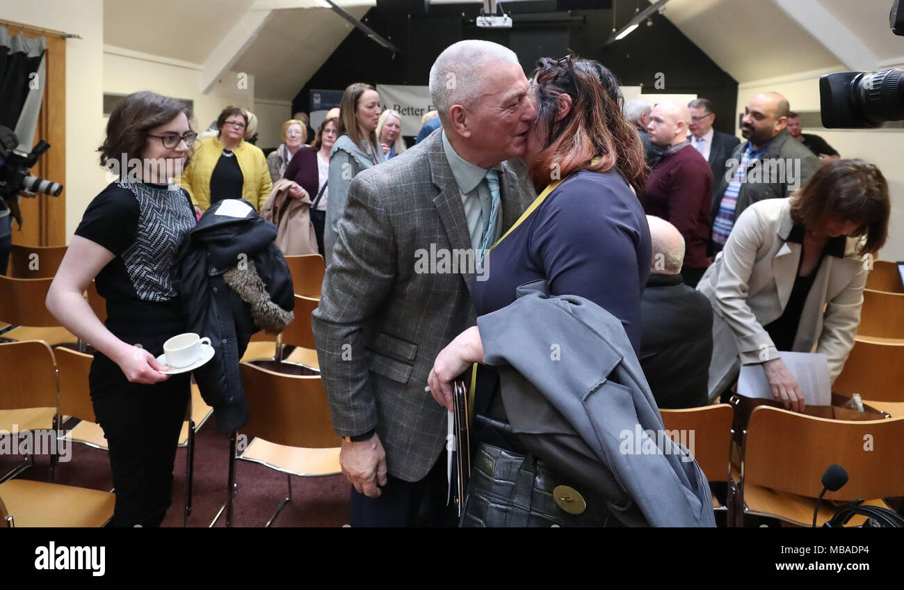 Jackie McDonald of Ulster Defence Association (UDA) is hugged by a well ...