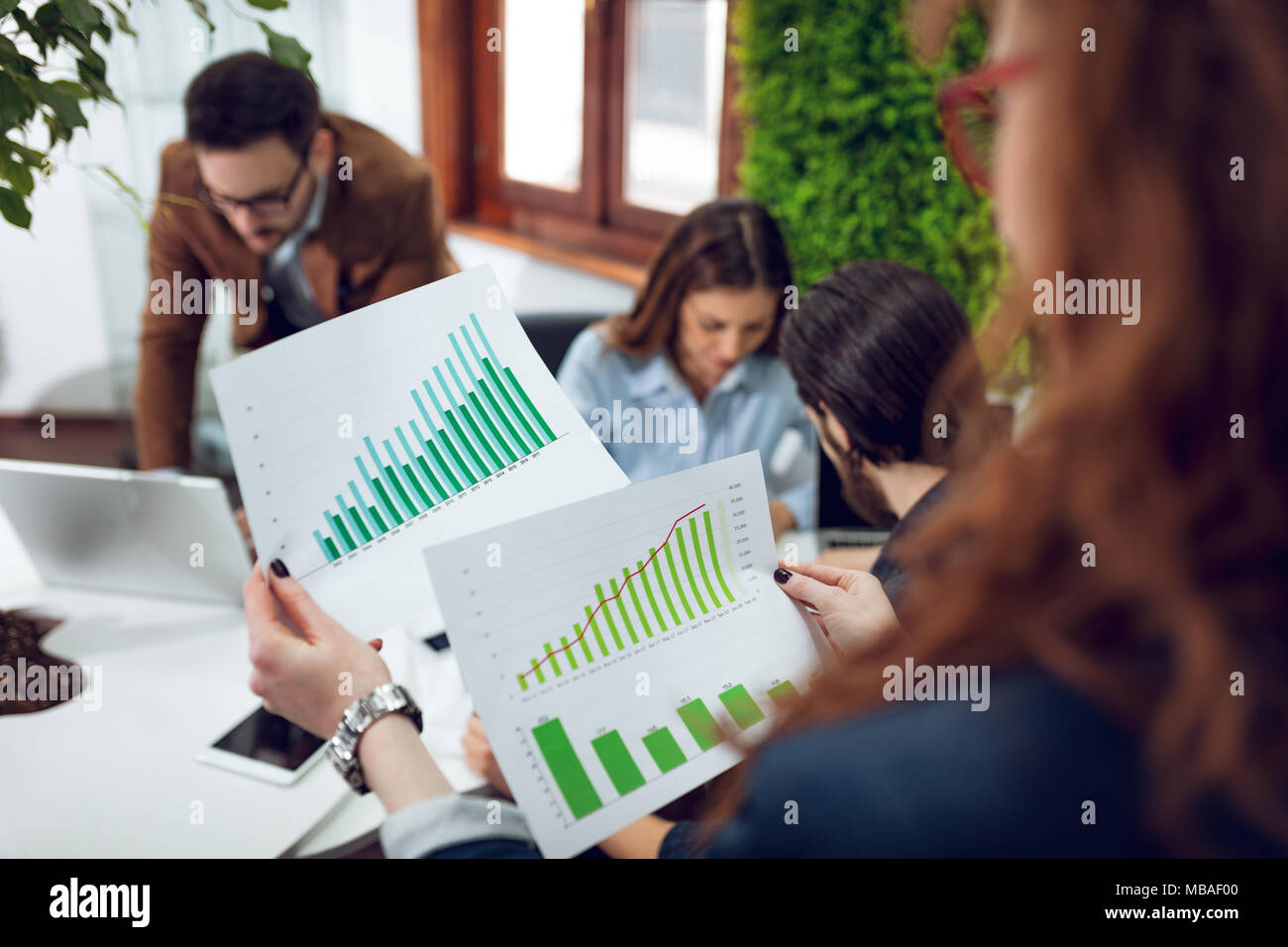 Young business managers crew working with new startup project, analyze ...