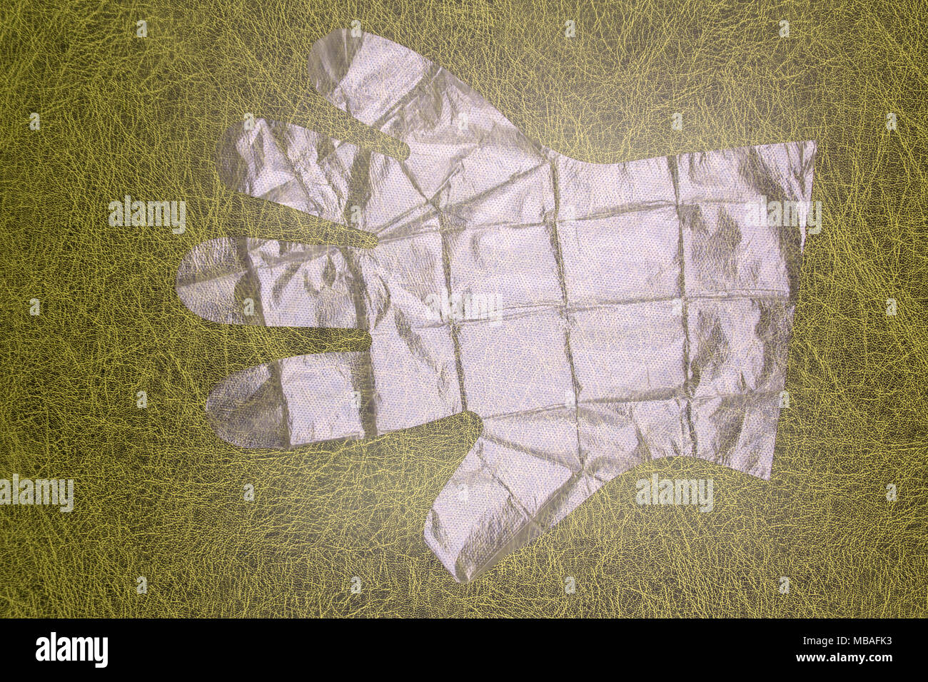 Disposable plastic glove protective safety single white Stock Photo - Alamy